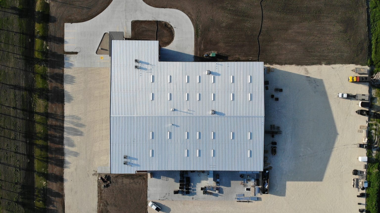 Choosing A Steel Building Roof: Screw Down Or Standing Seam?