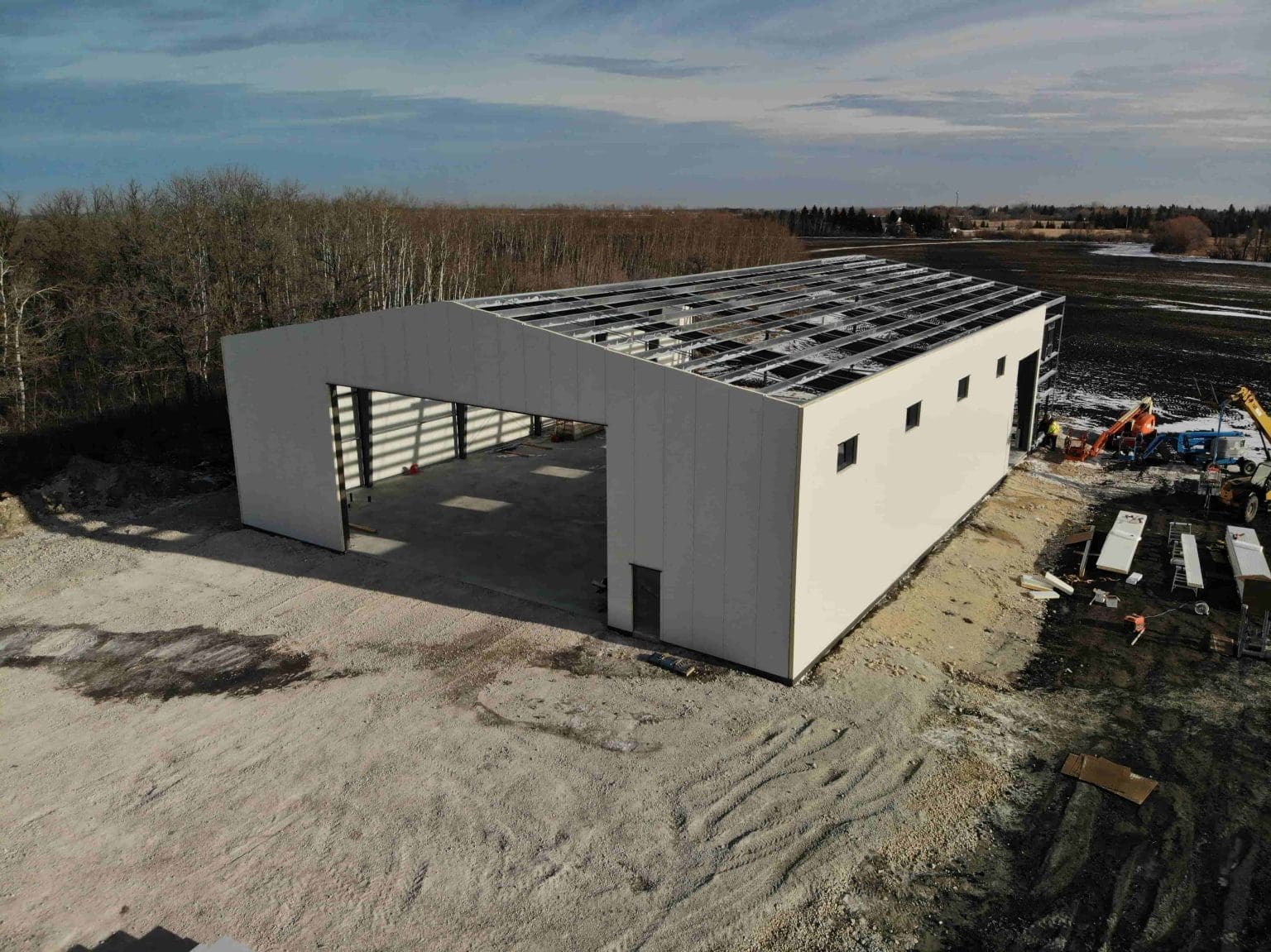 Farm Shop With IMPs 80x120 Glenn Mroz (VIDEO) - Northern Steel Buildings